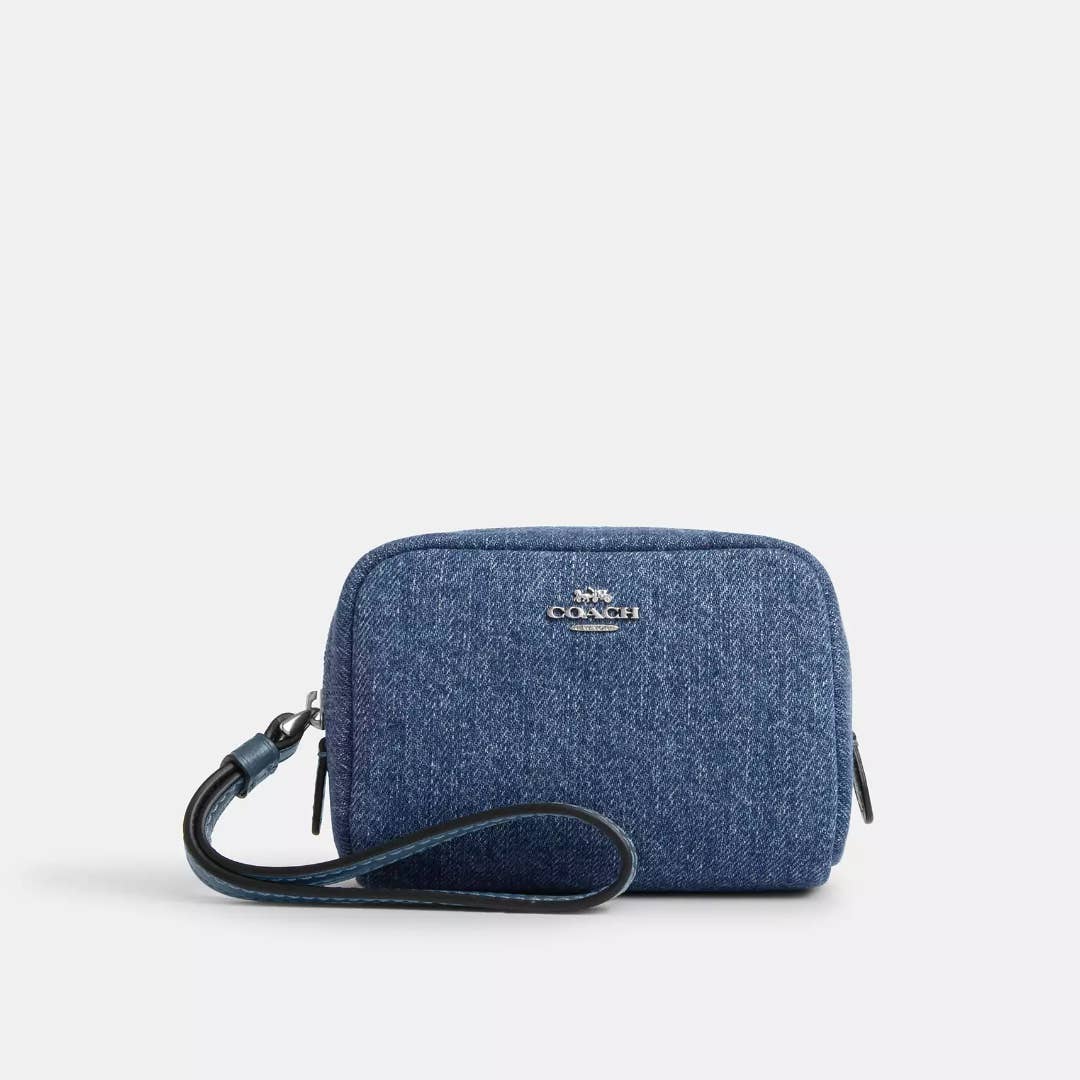 Coach Outlet is selling a $118 pouch wristlet for just $38 - TheStreet