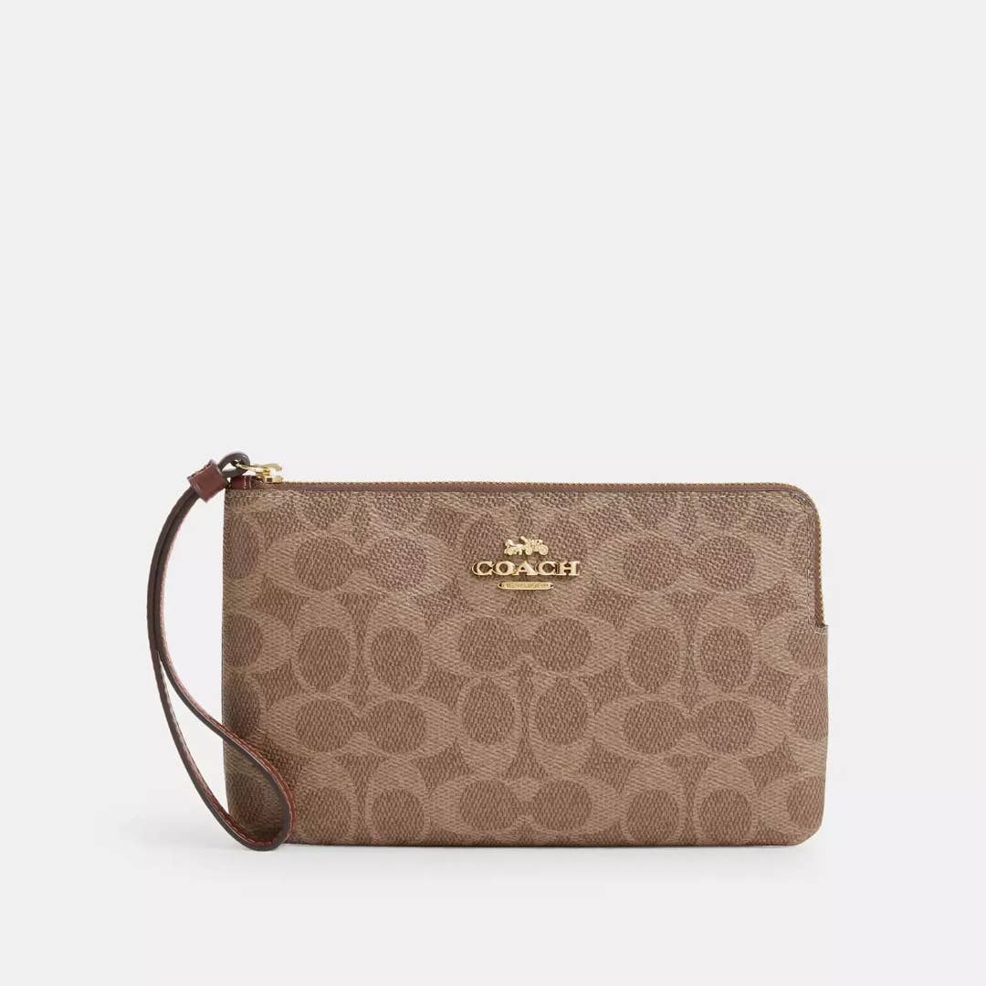 Coach Outlet is selling a $118 large wristlet for $49 - TheStreet