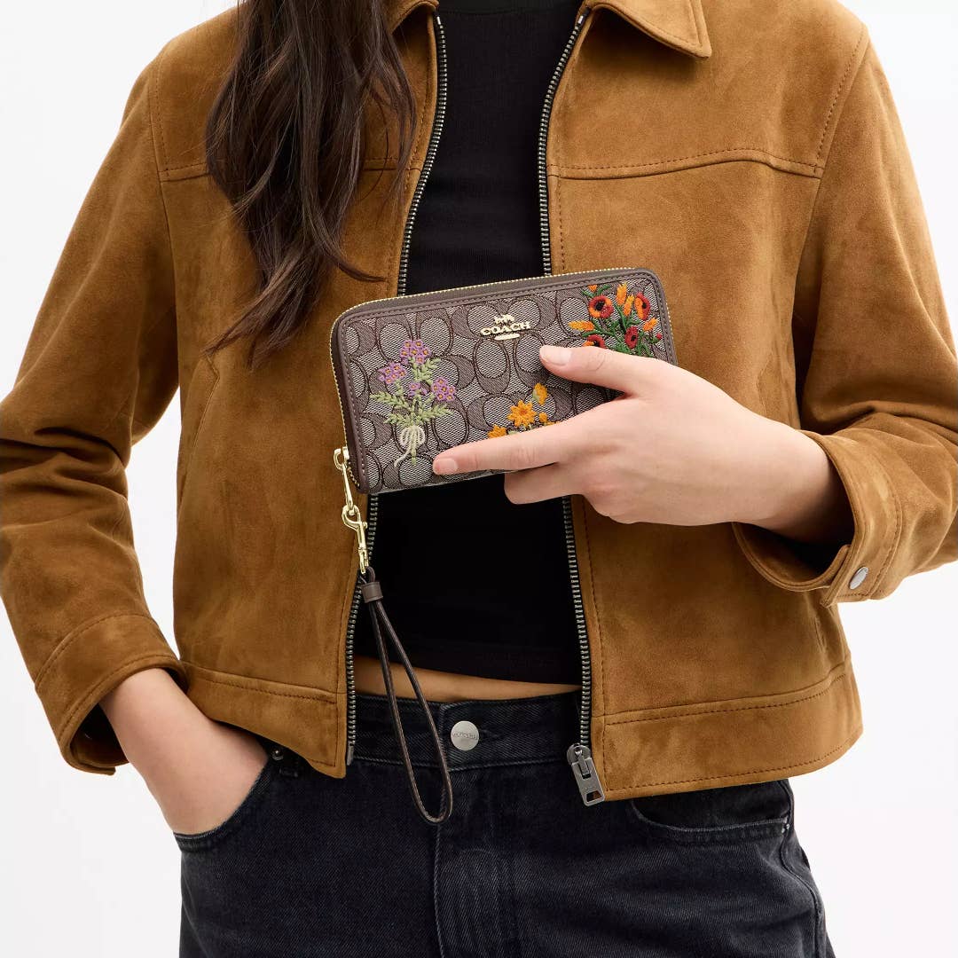 Coach Outlet has a new floral embroidery collection - TheStreet