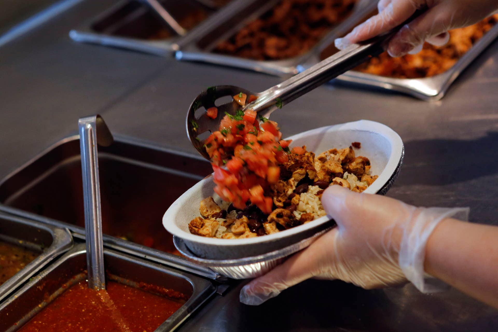 Chipotle revives generous offer for customers amid price hikes - TheStreet