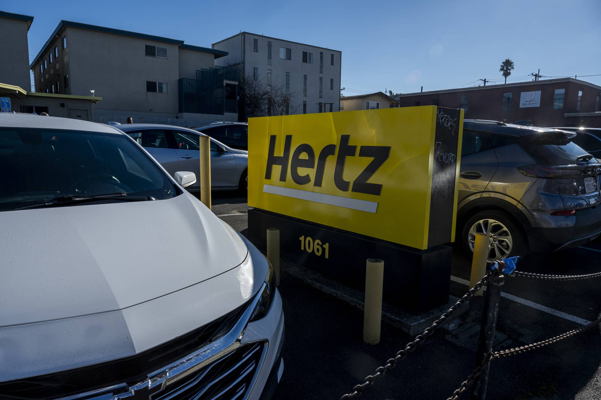 Hertz absorbed a massive loss after electric vehicle fire sale - TheStreet