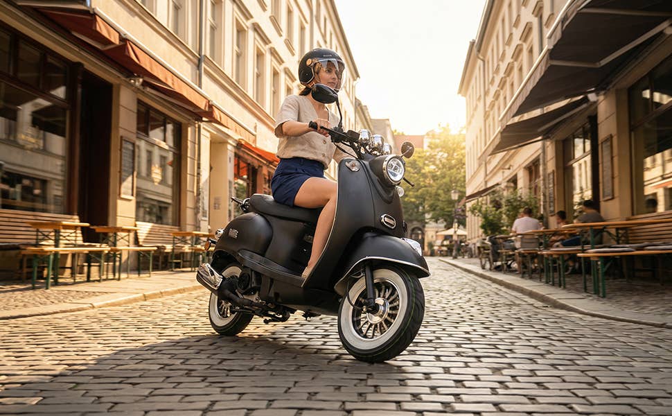 Why Mopeds Are Becoming Increasingly Popular in Cities - TheStreet ...