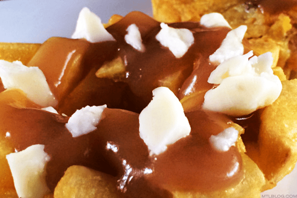 To Honor Canada's 150th Year, Tim Hortons Will Unleash Poutine Donuts ...