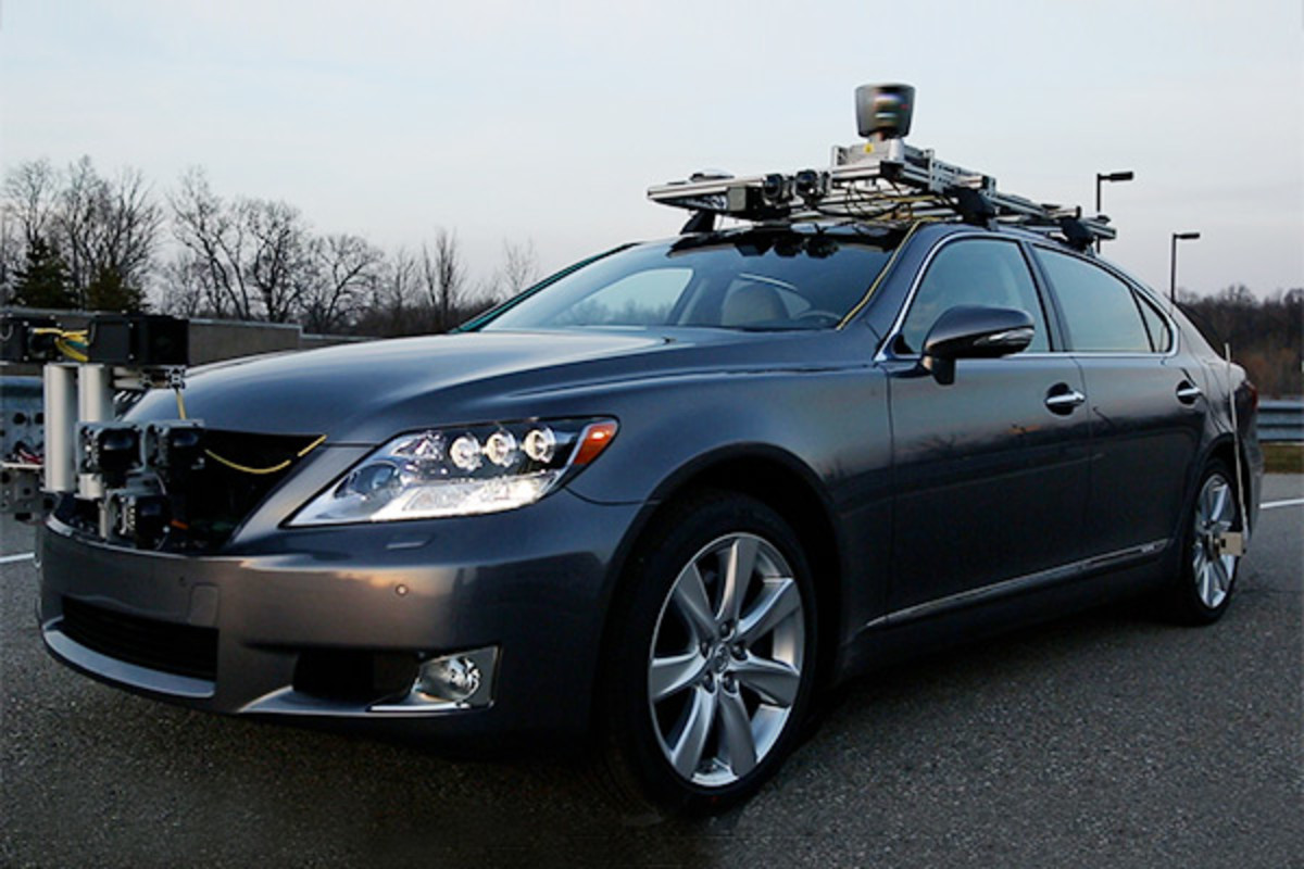 Autonomous Cars of the Future May Have Reclining Seats and Handheld ...