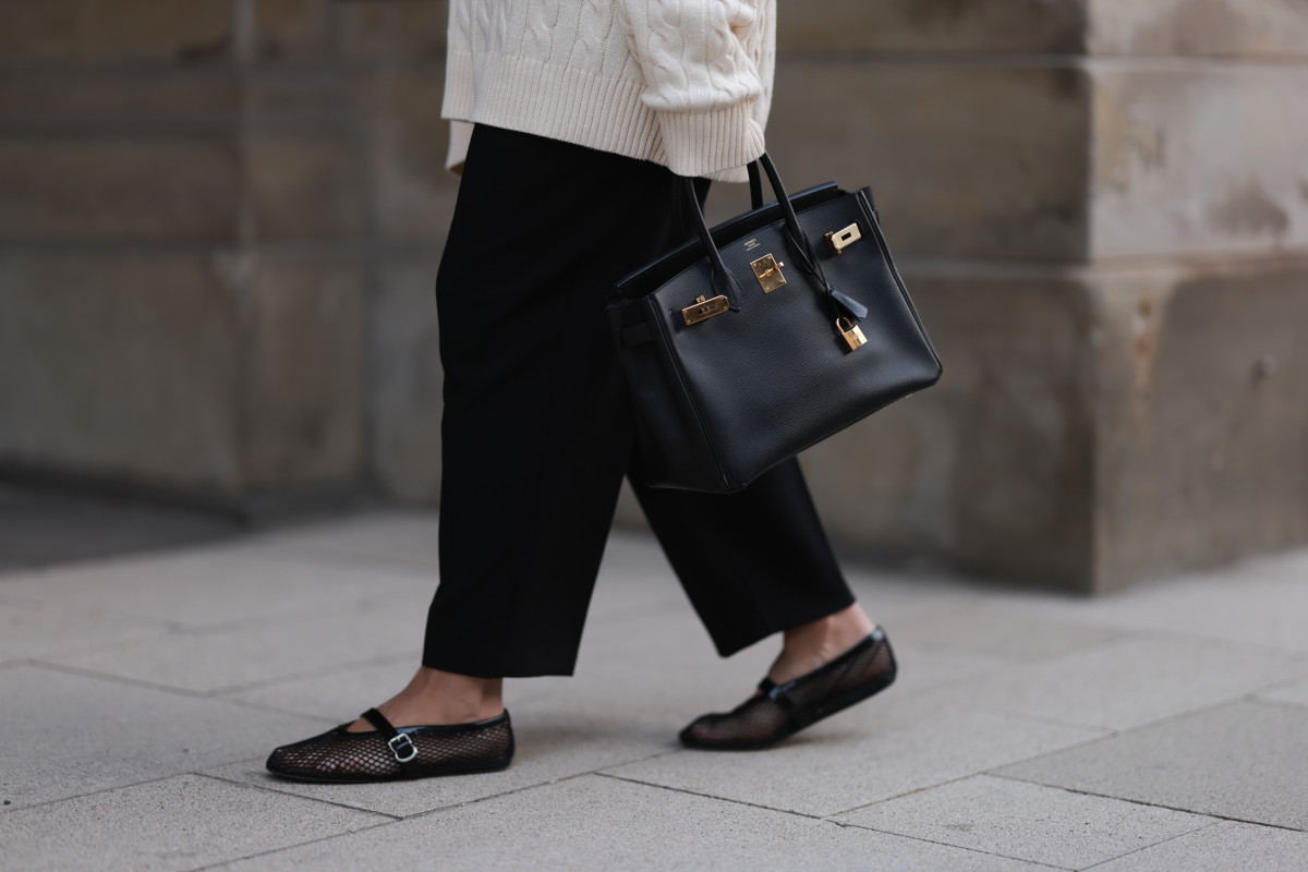 Popular designer handbag company sued for selling item only to ‘worthy ...