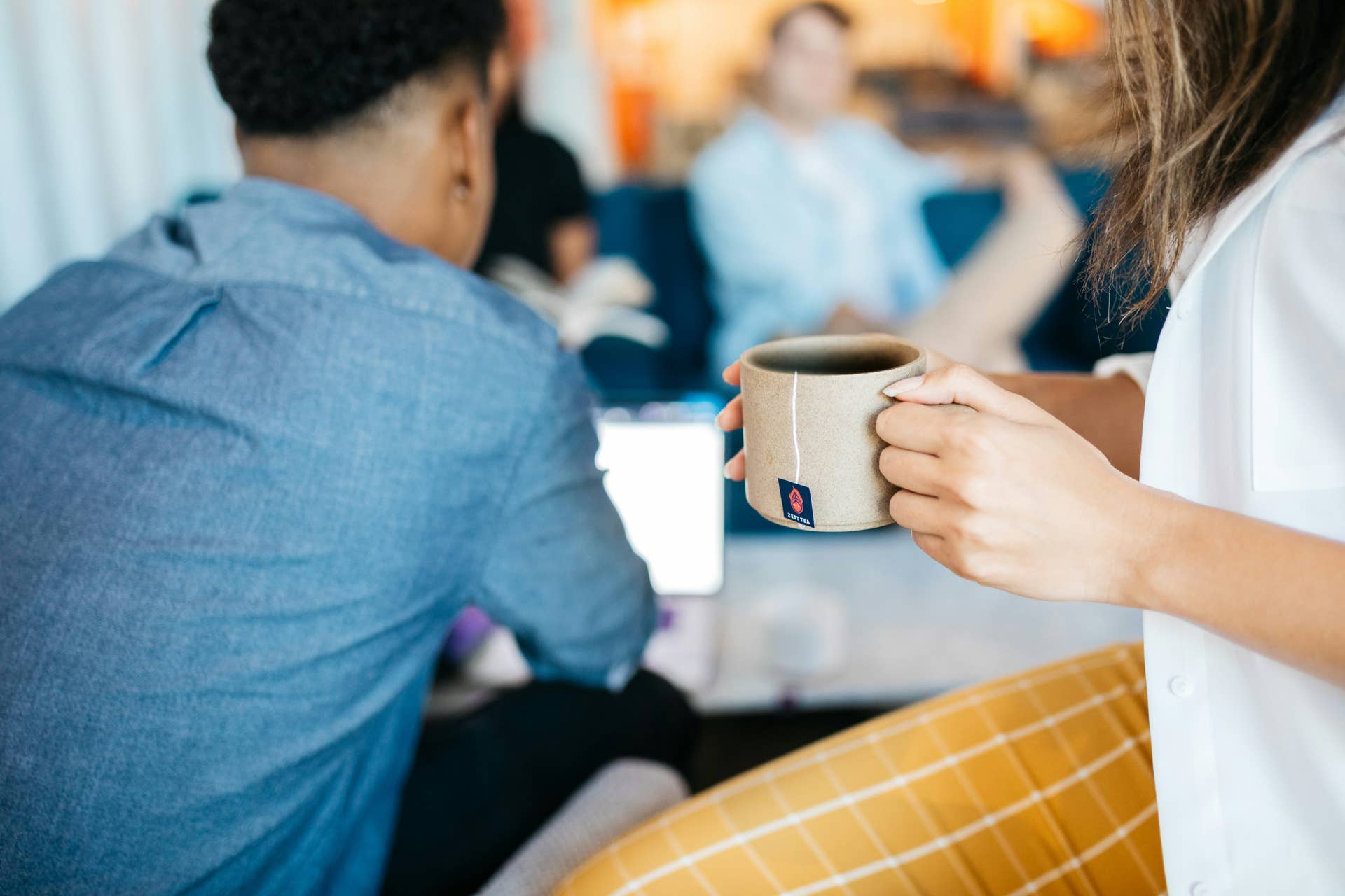 What is coffee badging? The hybrid work buzzword explained - TheStreet