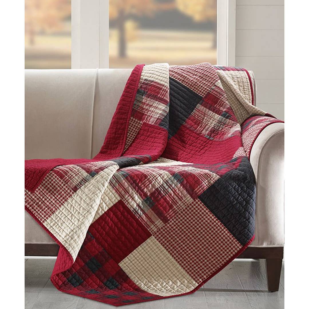 Macy's is selling a 'woodsy' $112 Woolrich throw for $45 - TheStreet