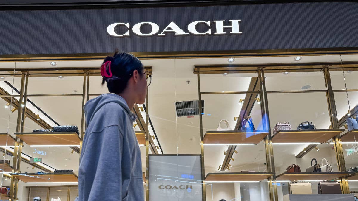 Coach Outlet's newspaper print collection starts at $45 - TheStreet