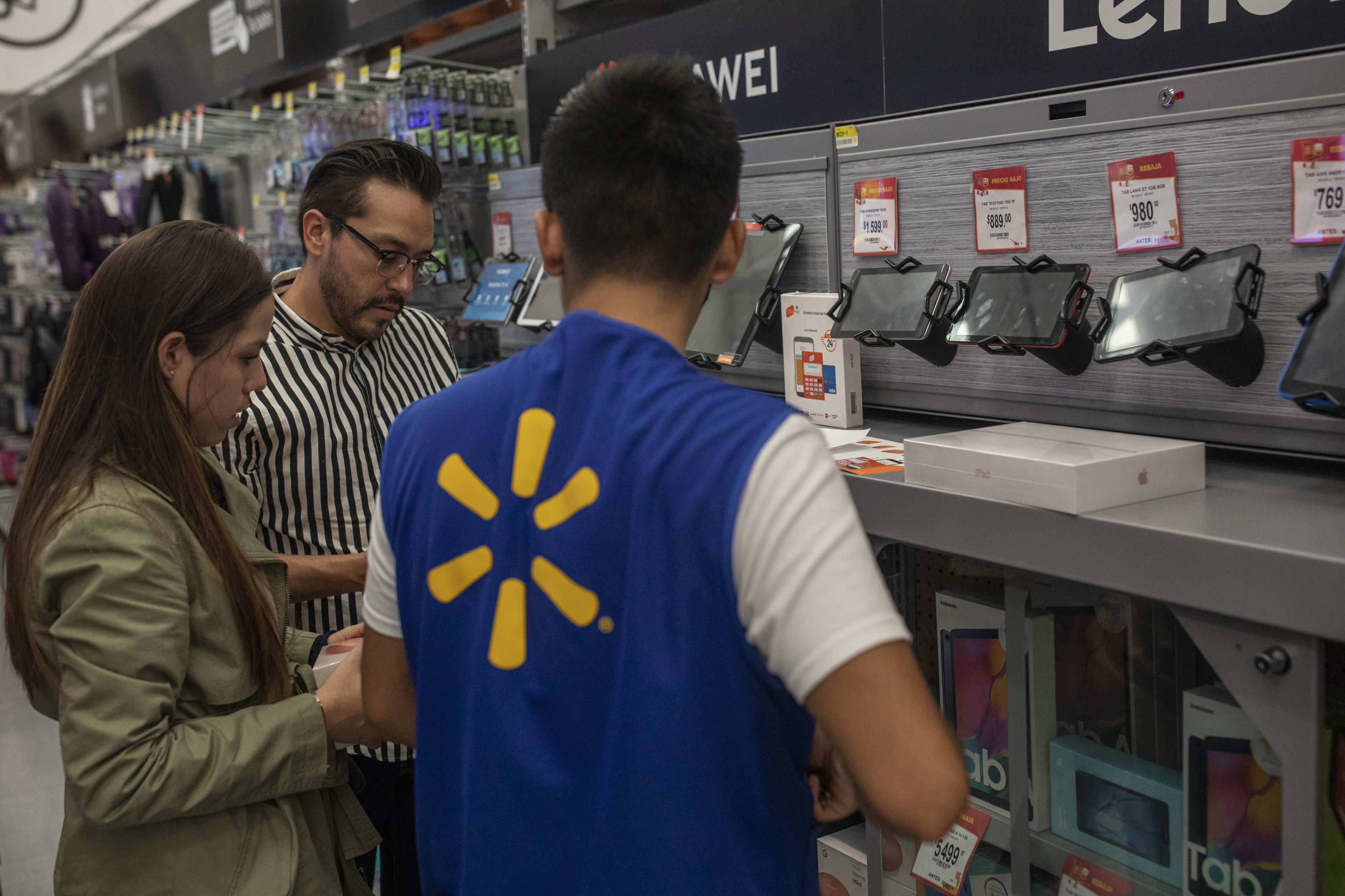 How much does Walmart pay? Salary, benefits, and what to know about the ...