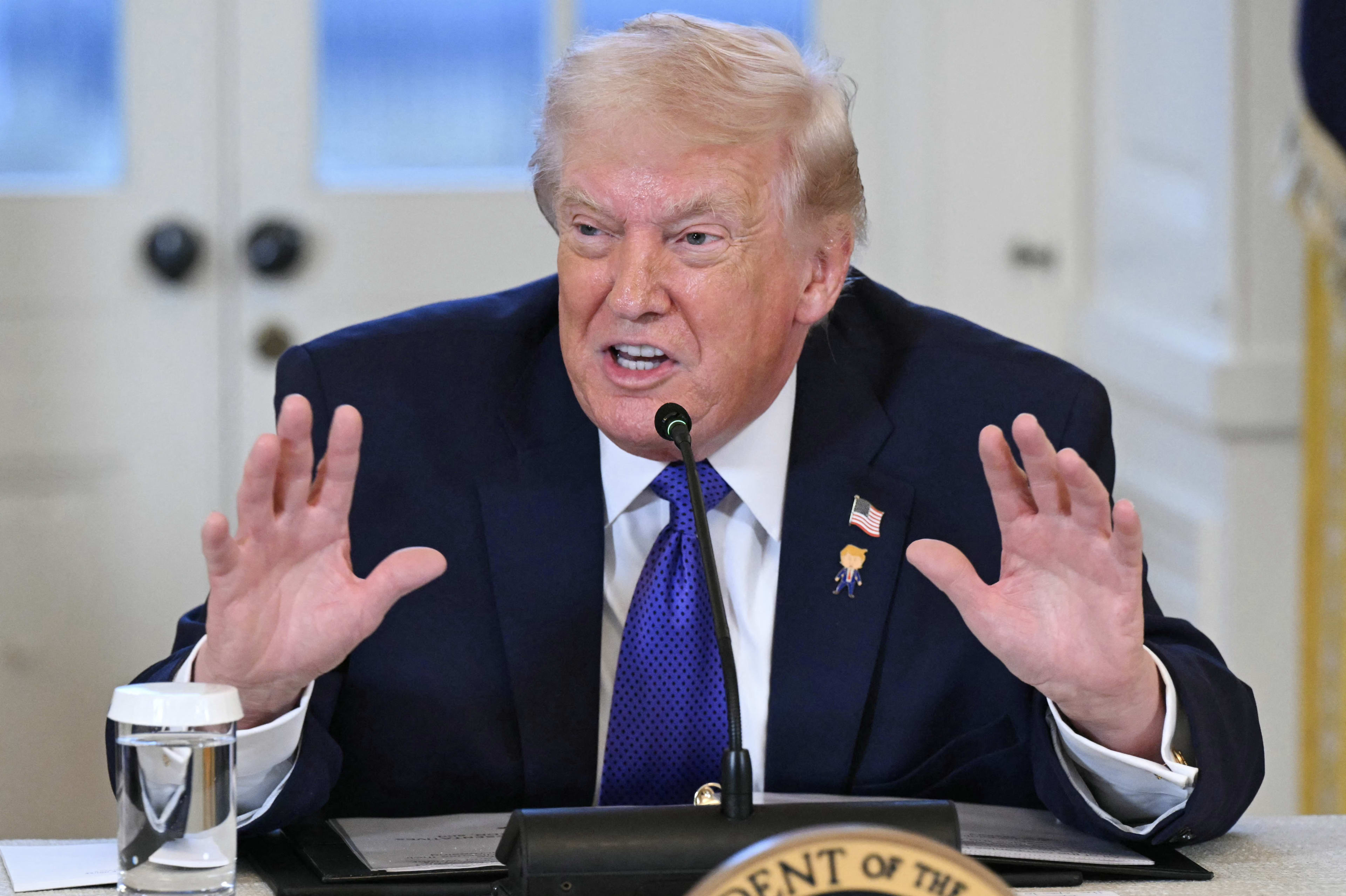 White House 10 percent card-rate cap push lifts bank stocks - TheStreet